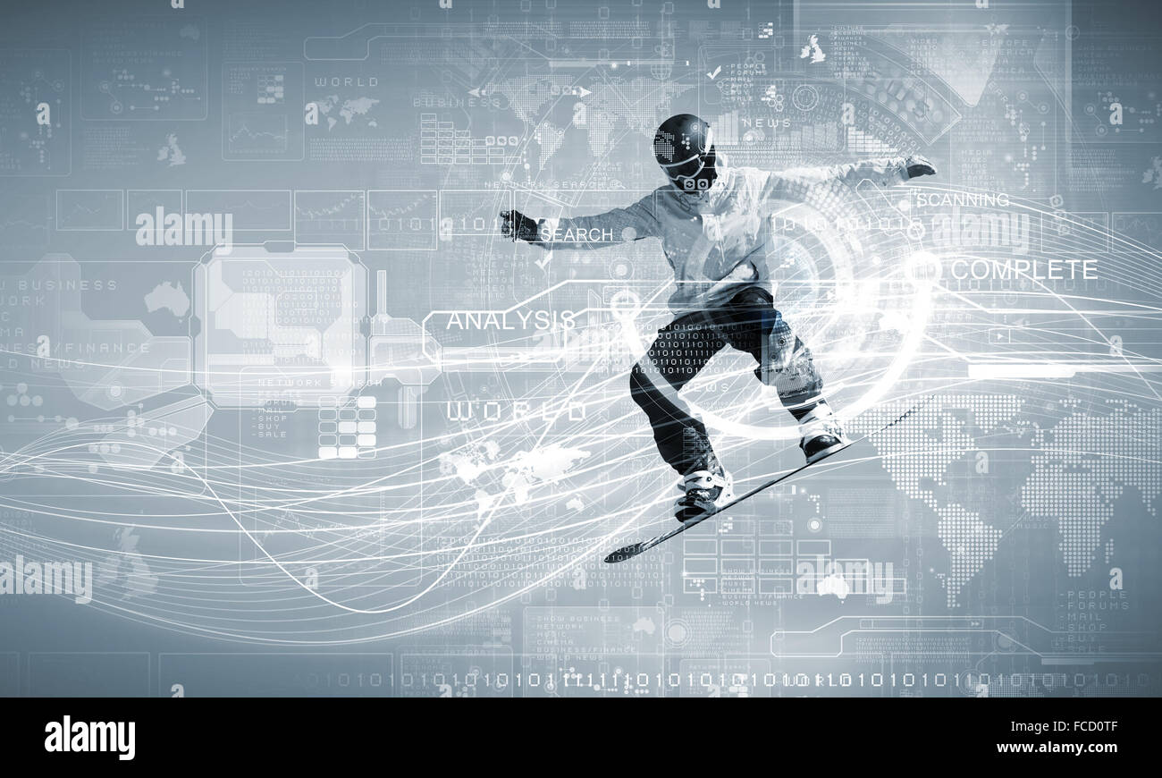Male snowboarder making jump against media background Stock Photo - Alamy