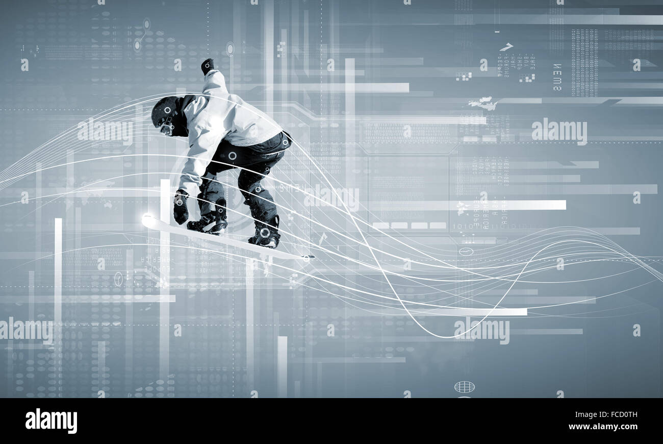 Male snowboarder making jump against media background Stock Photo - Alamy