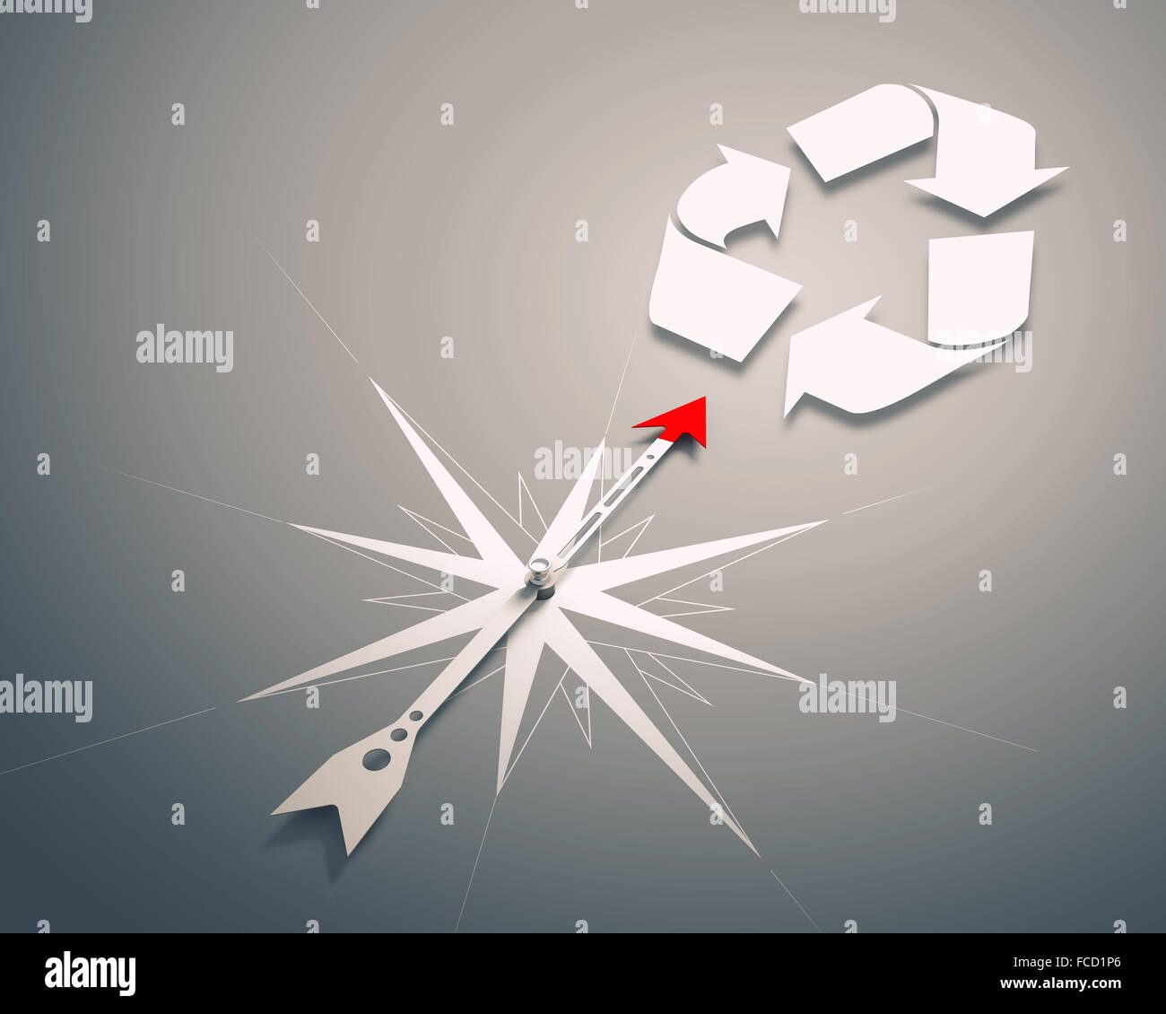 Conceptual image of compass directing at recycle symbol Stock Photo - Alamy