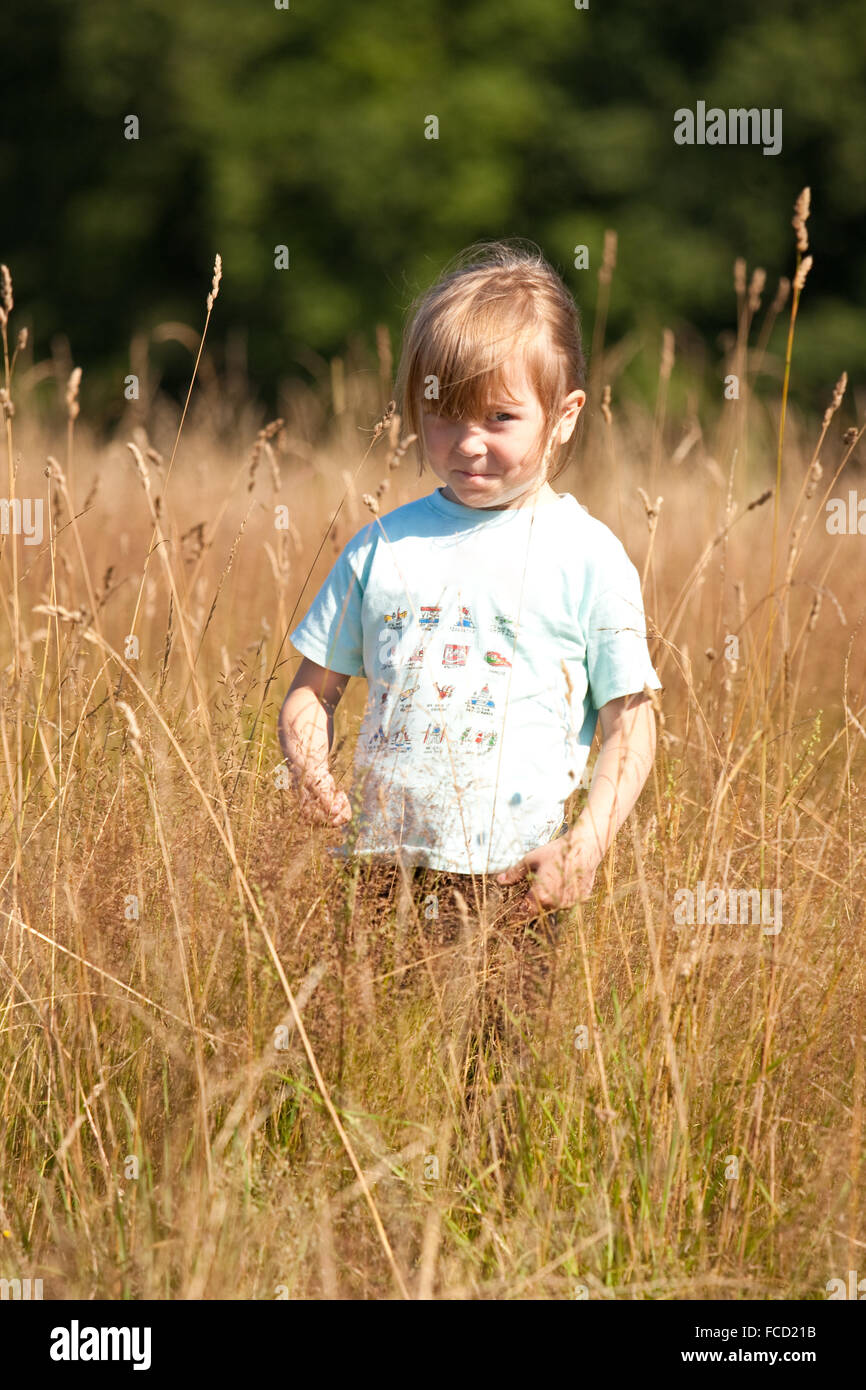 A child in the field Stock Photo - Alamy