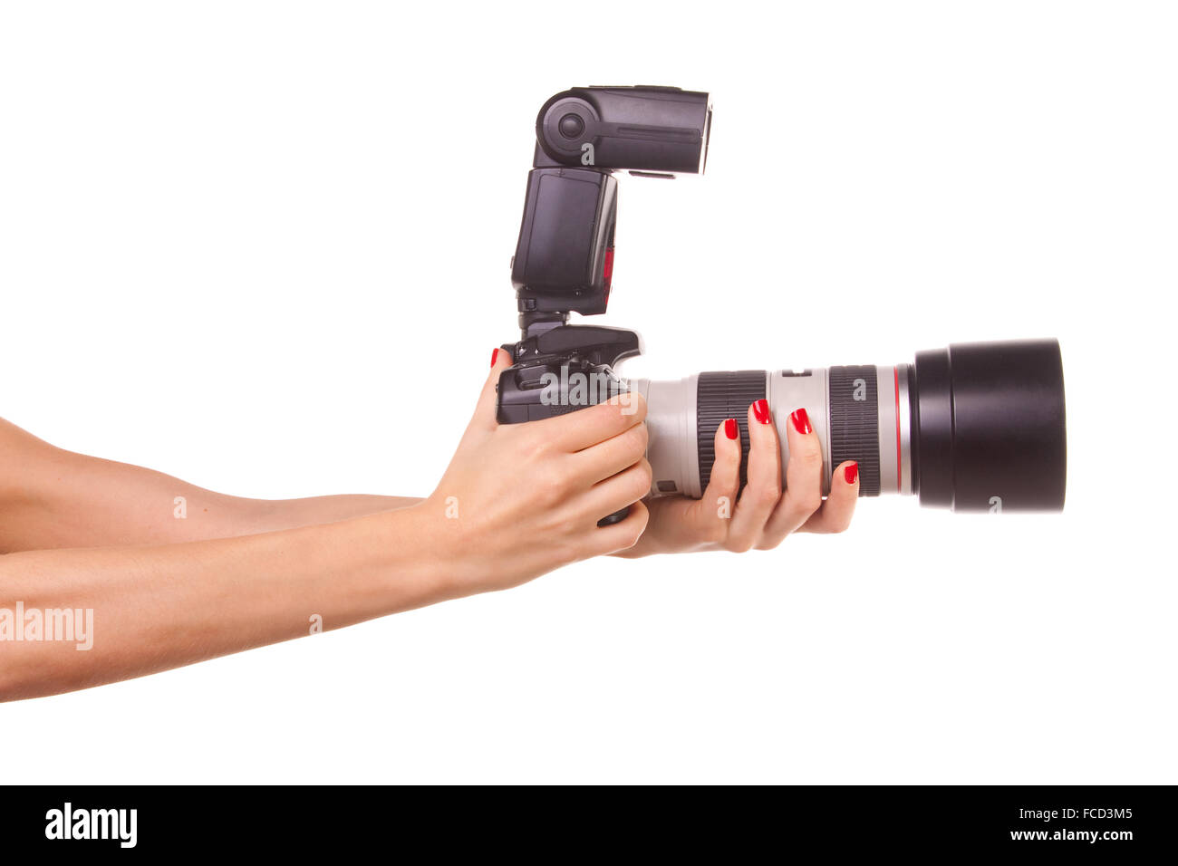 Women's hands holding the camera Stock Photo - Alamy