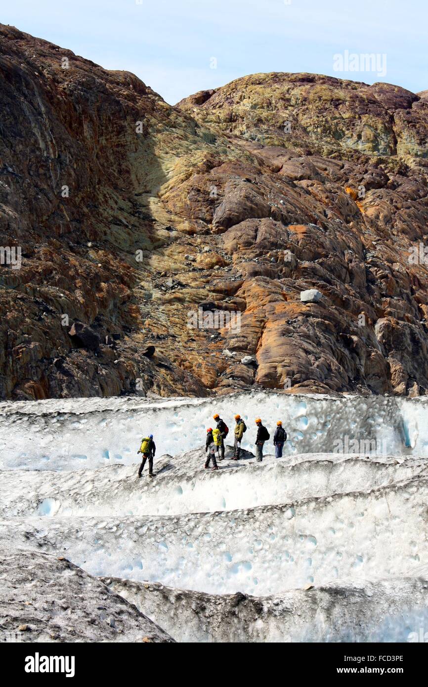 Group Of Hikers In An Extreme Adventure On The Mountain Stock Photo - Alamy
