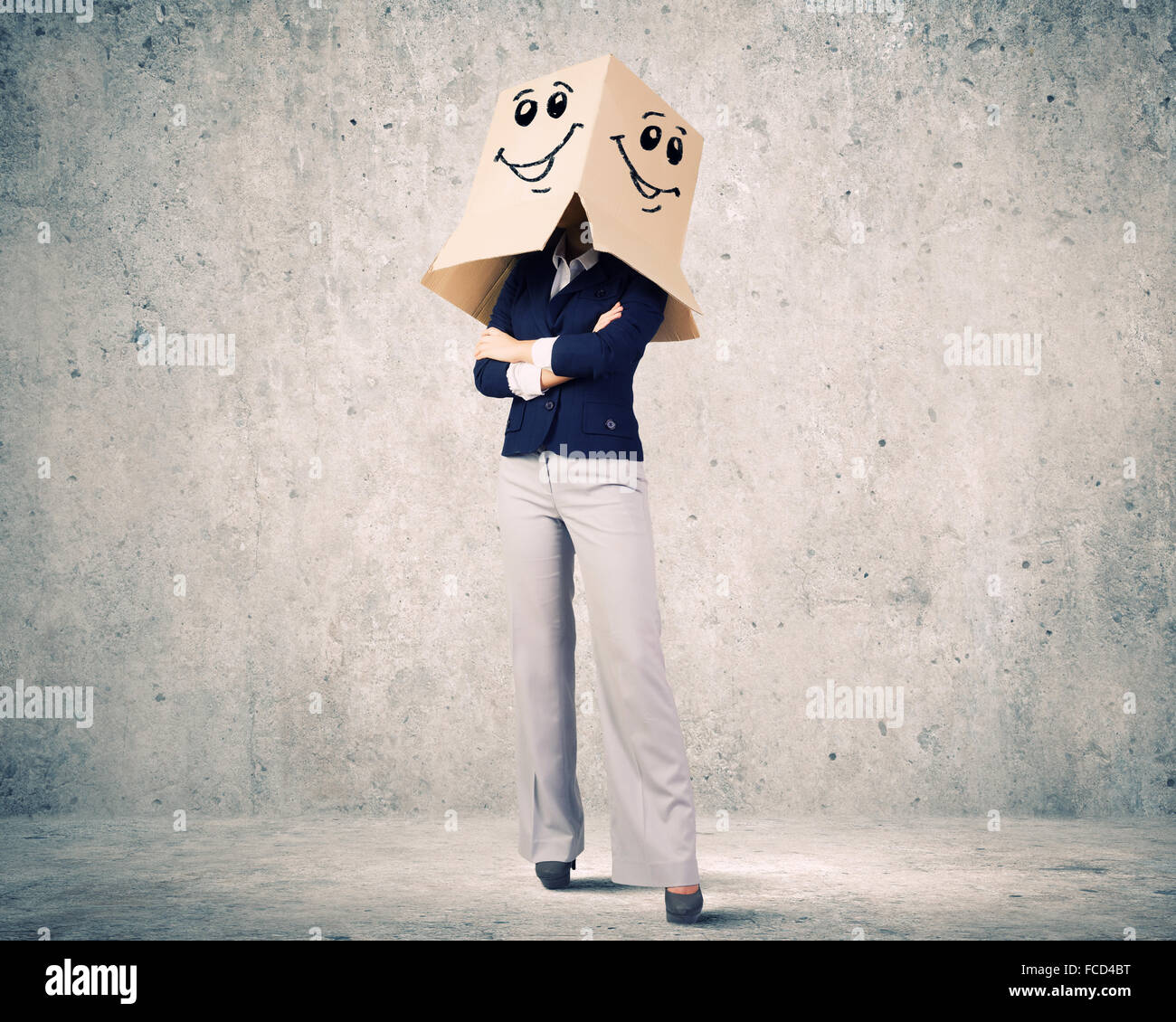 Woman wearing cardboard box happy face hi-res stock photography and ...