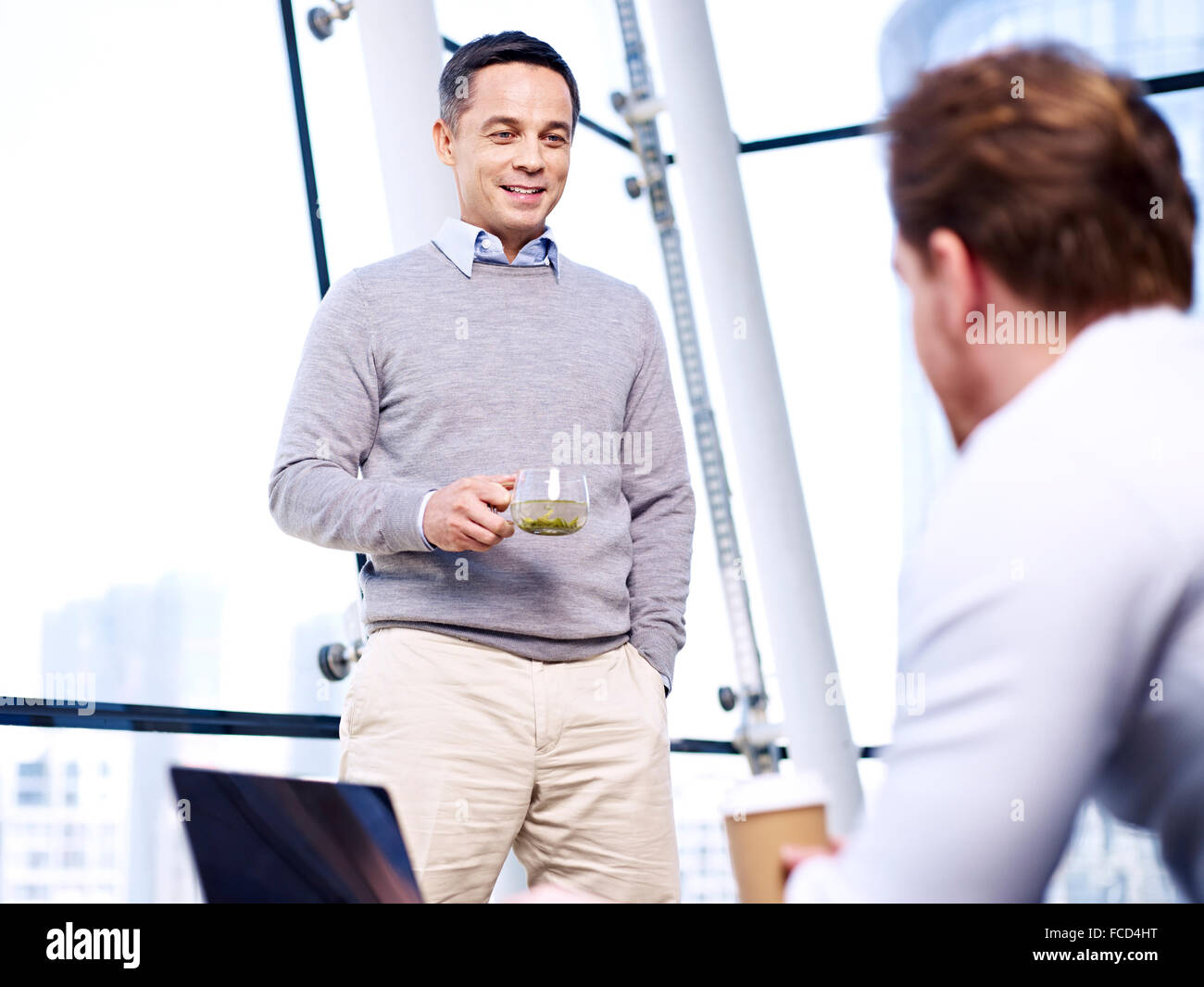 business people talking in office Stock Photo - Alamy
