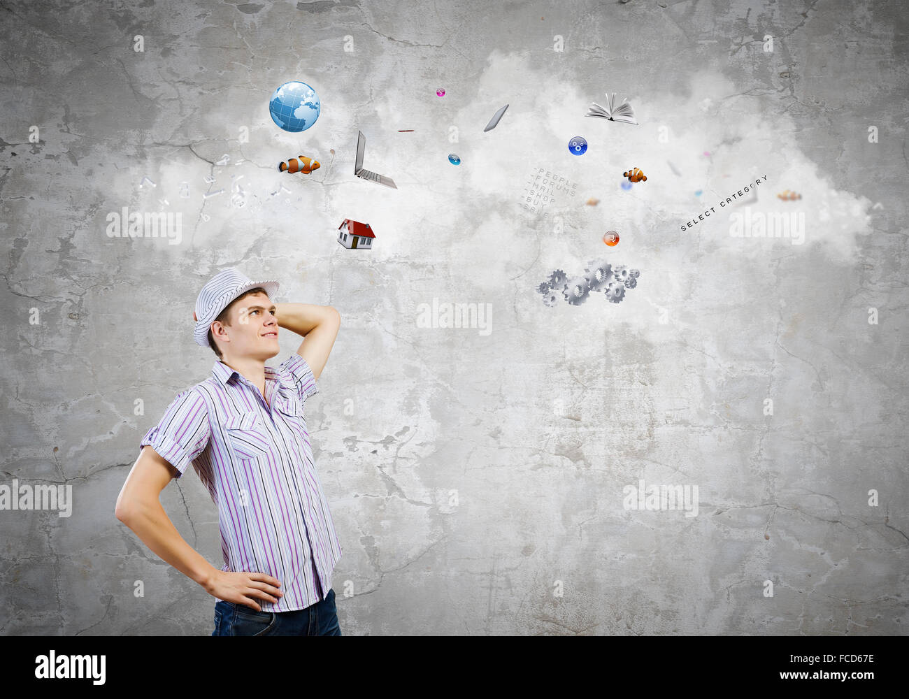 Young man in casual dreaming about future Stock Photo - Alamy