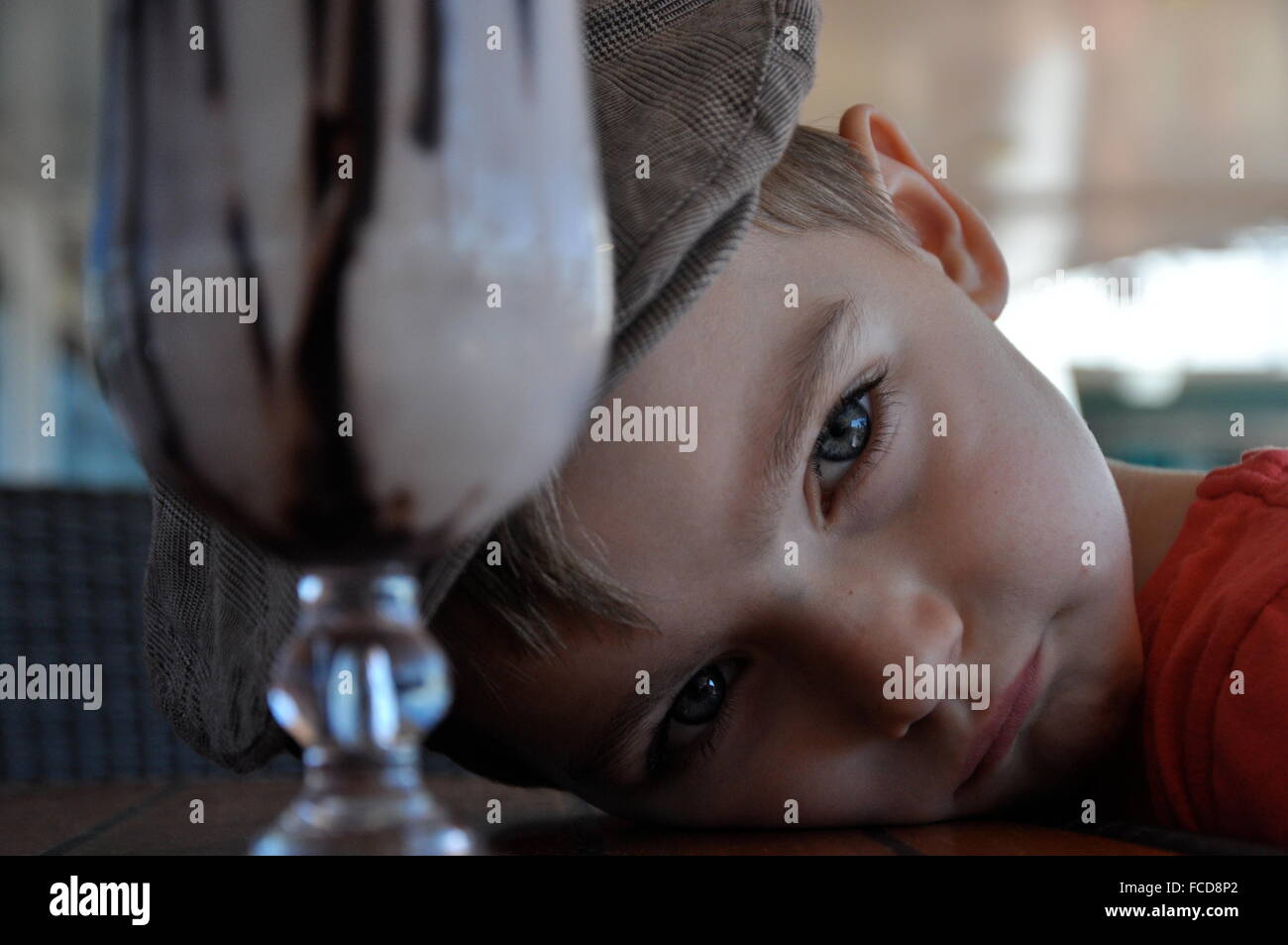 Resting head on table hi-res stock photography and images - Alamy