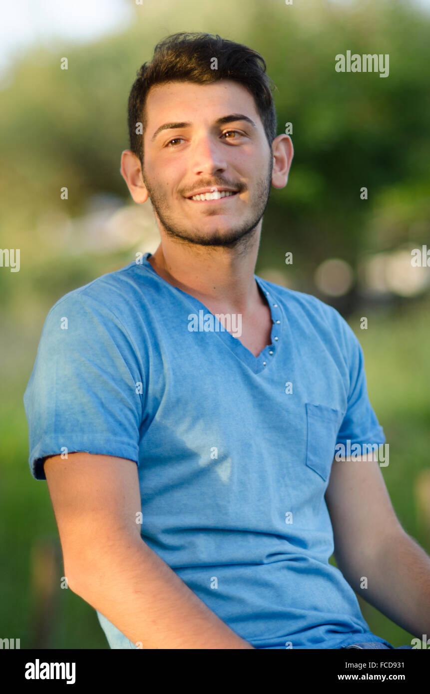 Close-Up Of A Young Man Smiling Stock Photo - Alamy