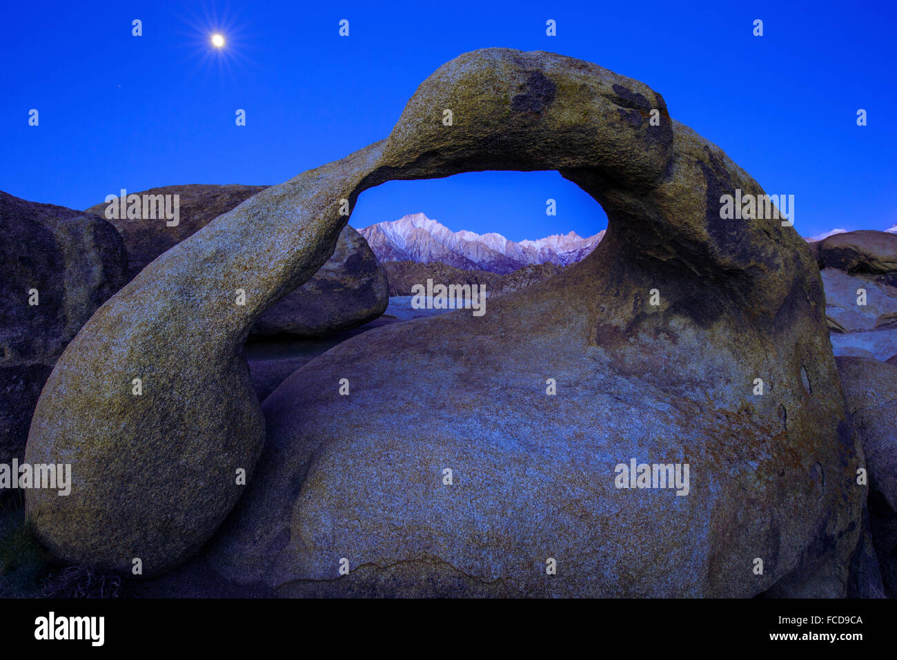 Mobius Arch in Alabama Hills at night with moon and Mount Whitney and ...