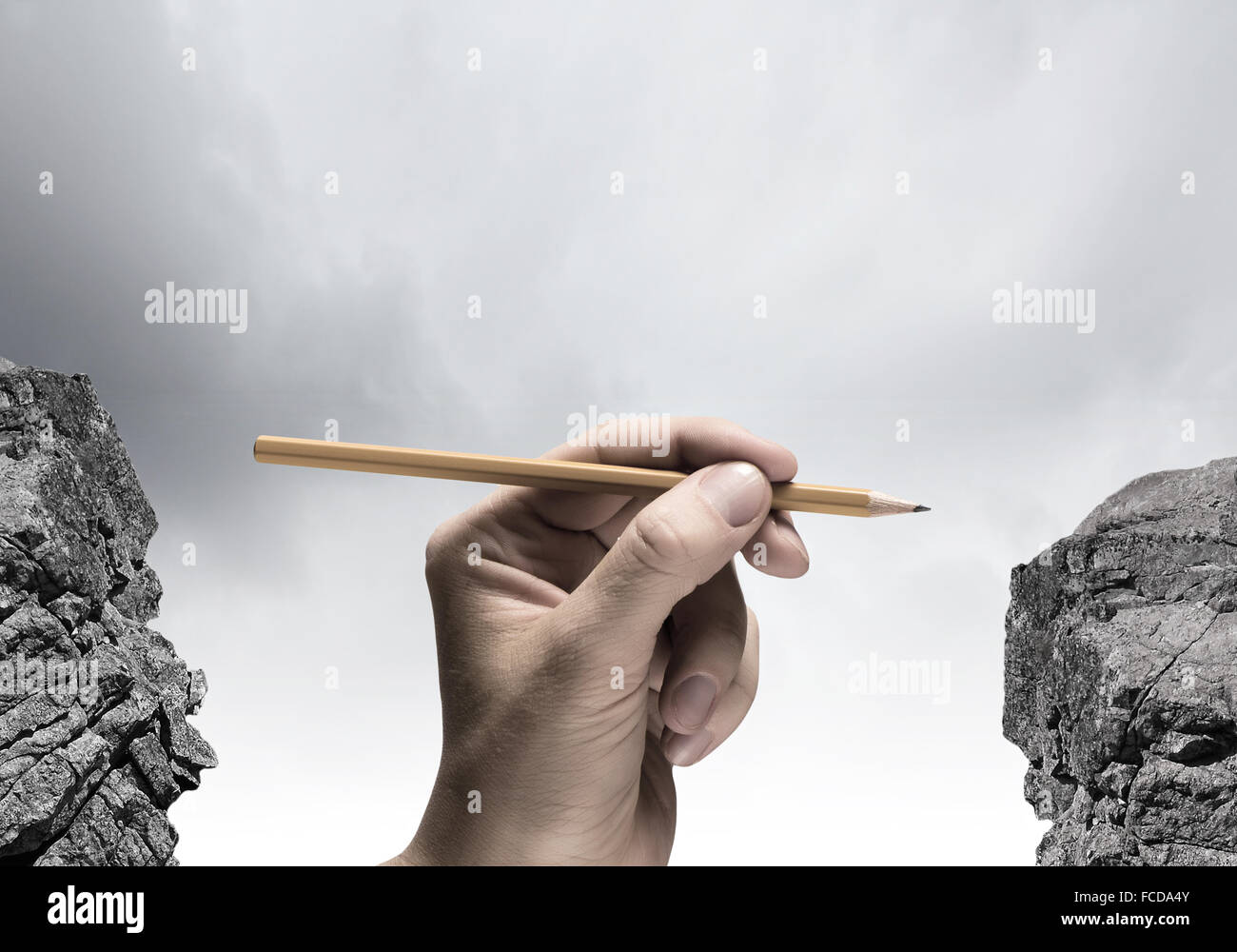 Close up of human hand holding pencil Stock Photo - Alamy