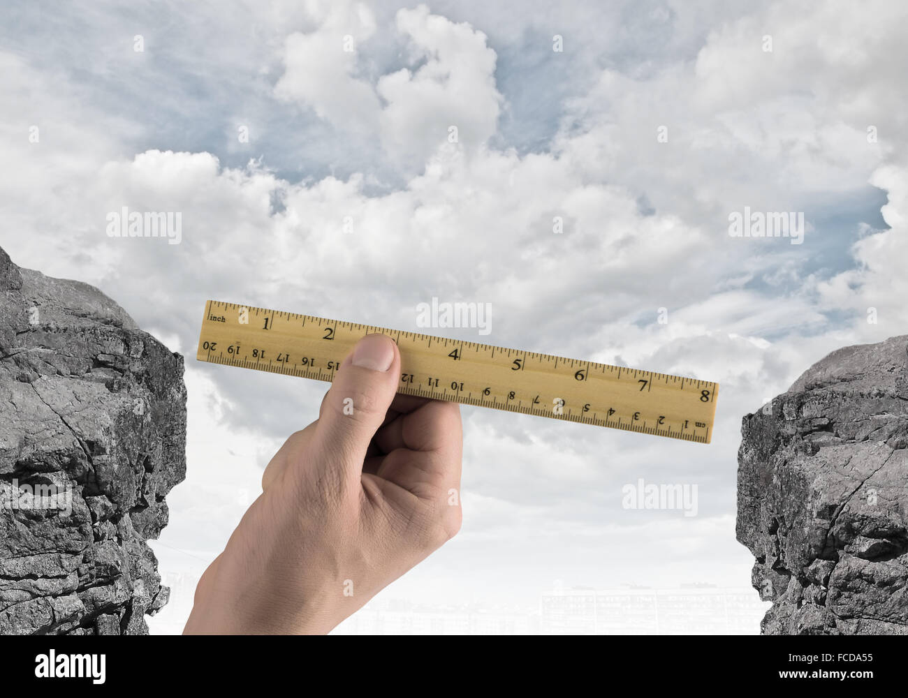 Close up of human hand measuring gap with ruler Stock Photo - Alamy