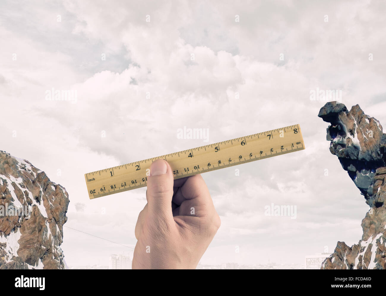 Close up of human hand measuring gap with ruler Stock Photo - Alamy