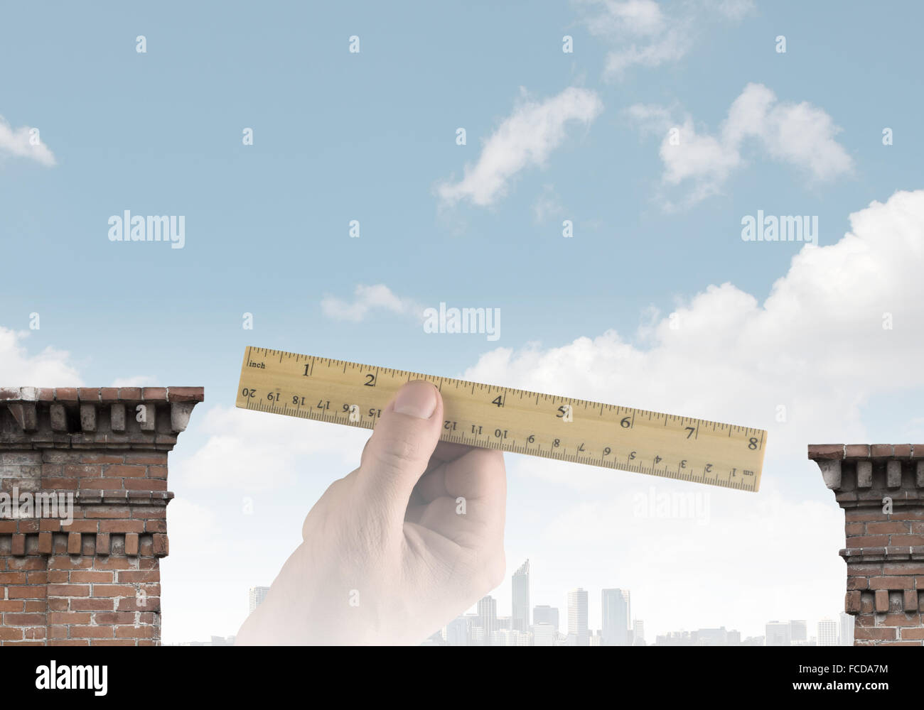 Close up of human hand measuring gap with ruler Stock Photo - Alamy