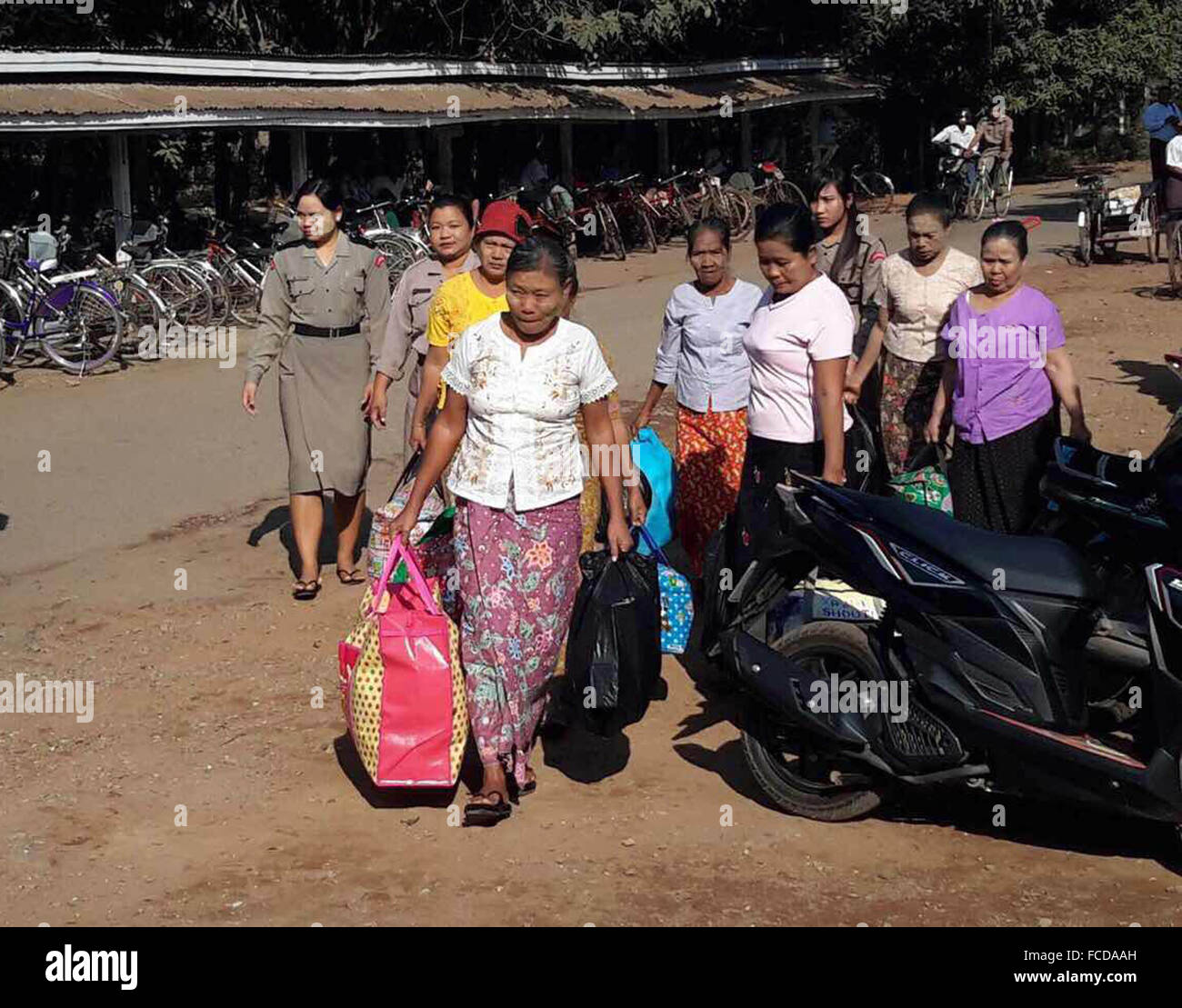 Yangon, Myanmar. 22nd Jan, 2016. Released prisoners walk out of the ...