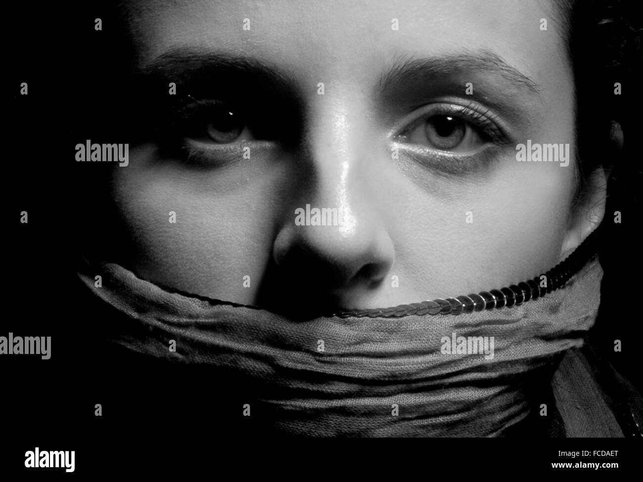 Woman Covering Her Face With A Stole Stock Photo - Alamy