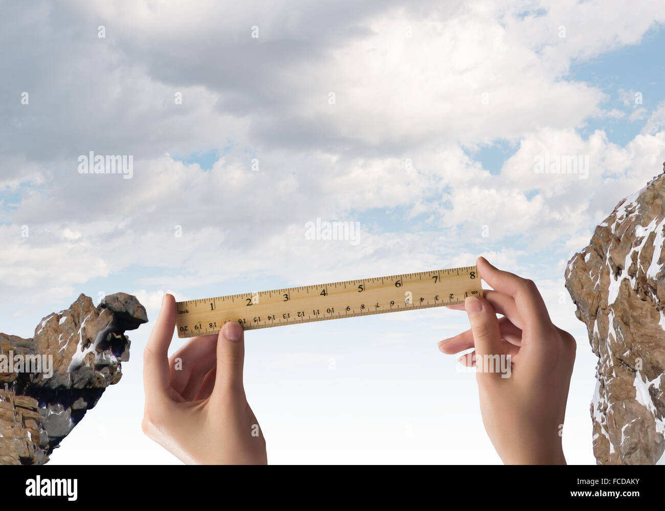 Close up of human hand measuring gap with ruler Stock Photo - Alamy