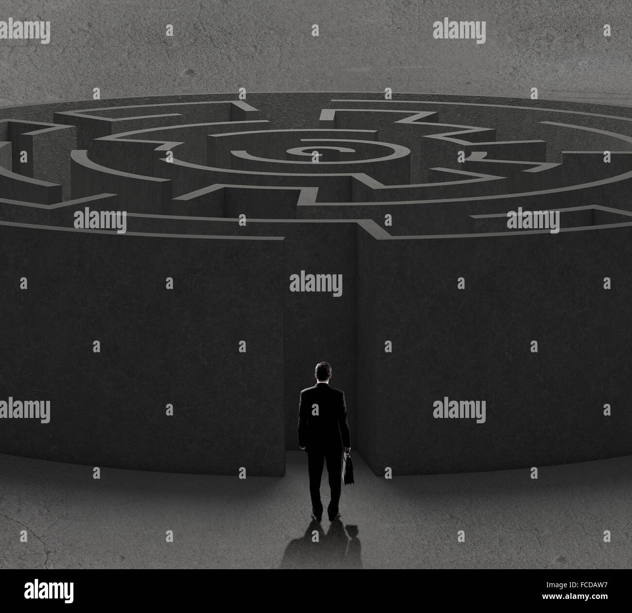 Successful businessman standing near the entrance of labyrinth Stock ...
