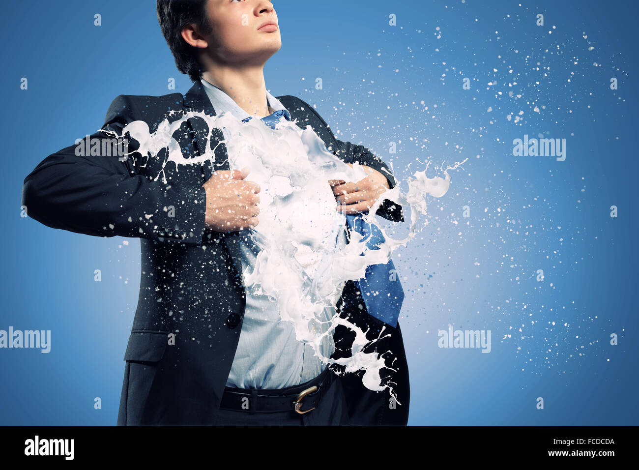 Businessman in suit tearing his shirt on chest Stock Photo - Alamy