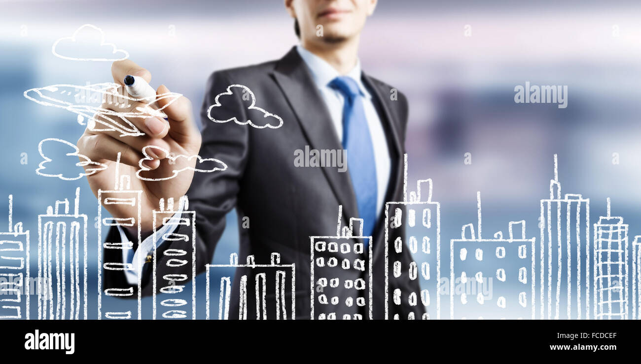 Close up of young man drawing construction model Stock Photo - Alamy