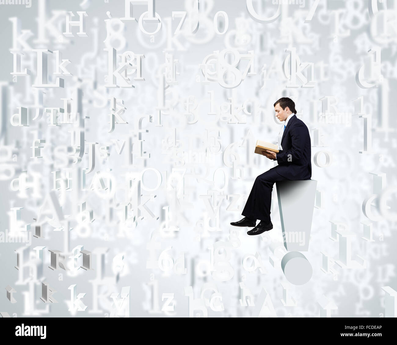 Businessman with book sitting on top of exclamation mark Stock Photo ...