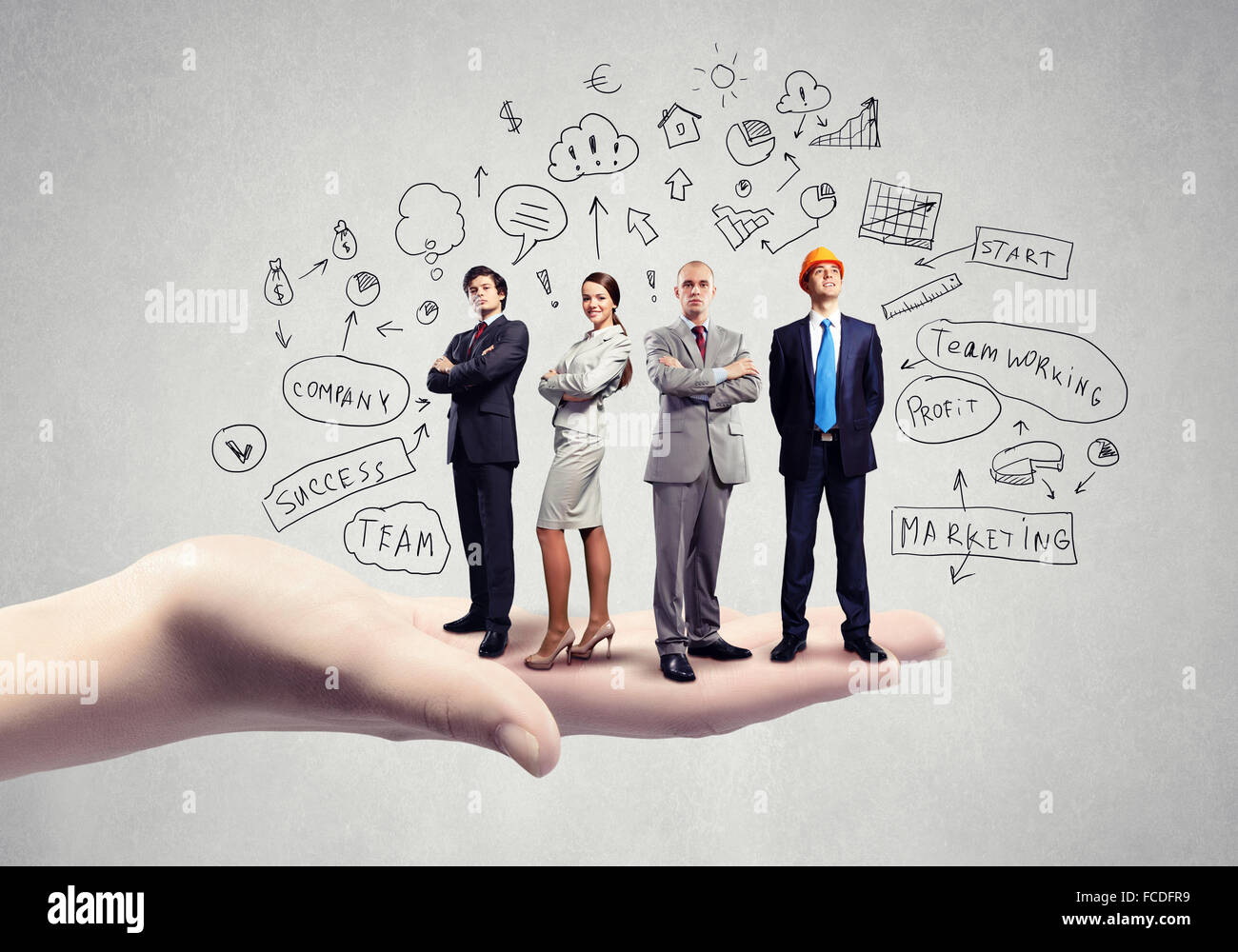 Business people of different professions standing on palm Stock Photo ...