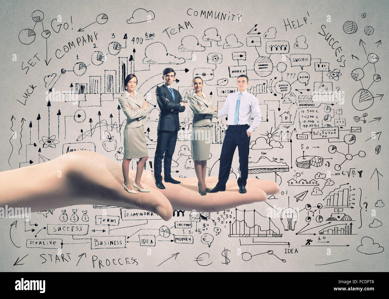 Business people of different professions standing on palm Stock Photo ...