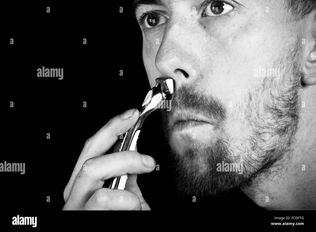 Ritual shaving Black and White Stock Photos & Images - Alamy