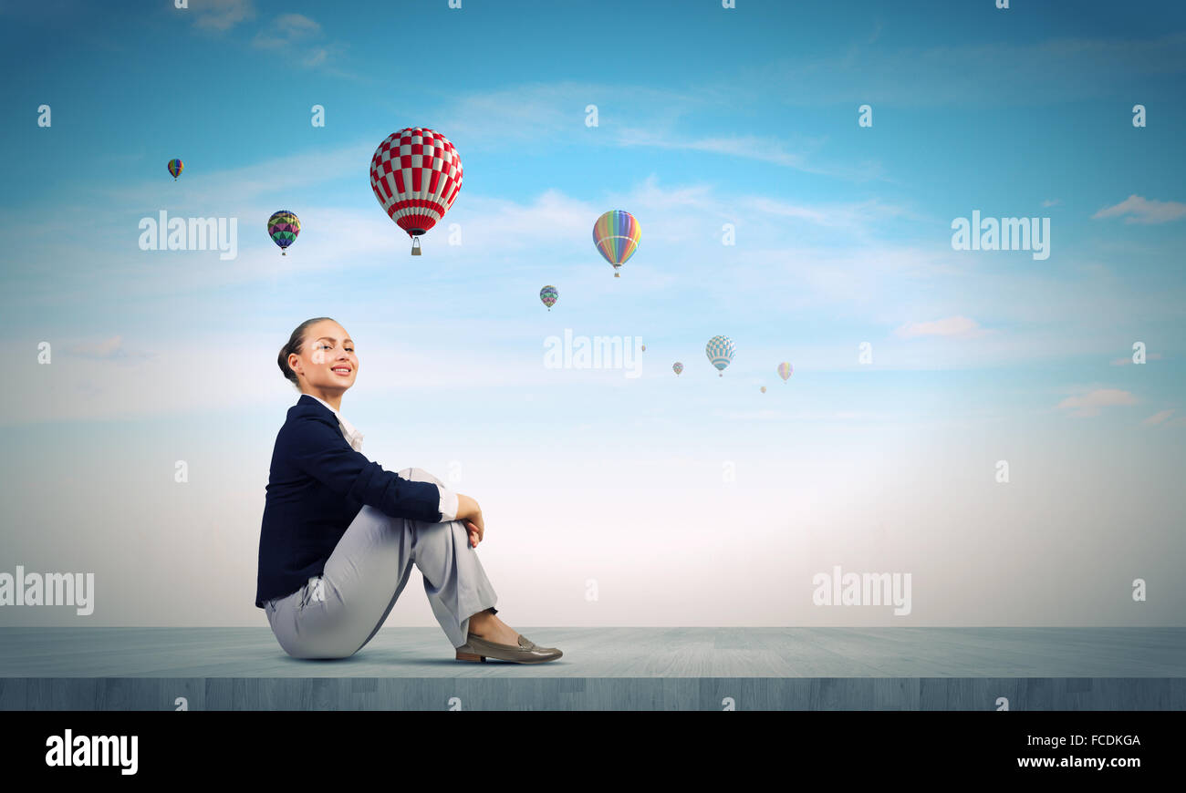 Girl sitting on balloon flying hi-res stock photography and images - Alamy