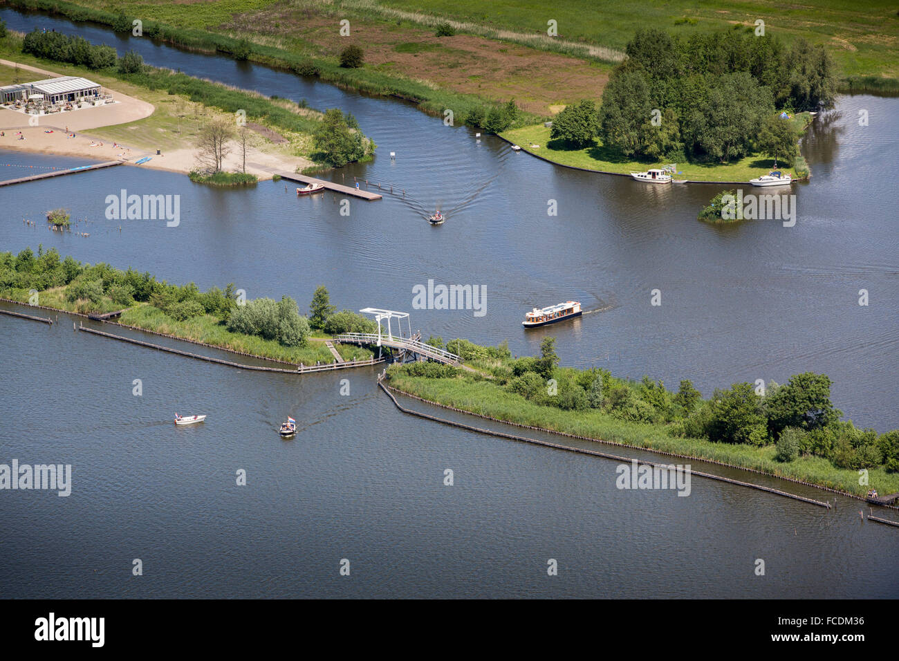 Netherlands, Nieuwkoop, Lakes called Nieuwkoopse Plassen. Bridge over ...