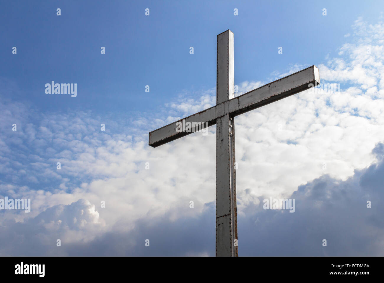 A large iron cross, immortalized in back light Stock Photo - Alamy