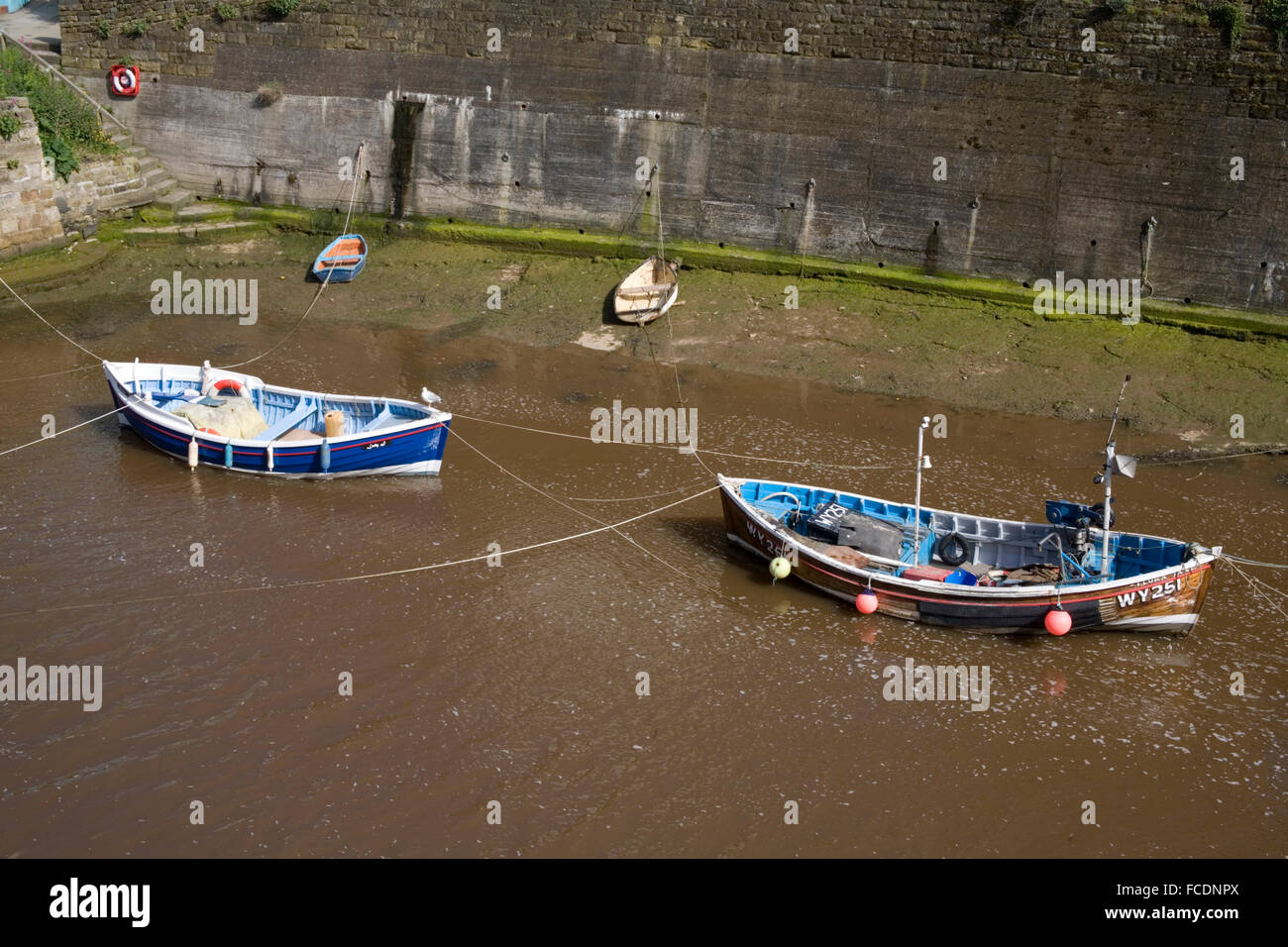 Fishing boats anchored in river hi-res stock photography and images - Alamy