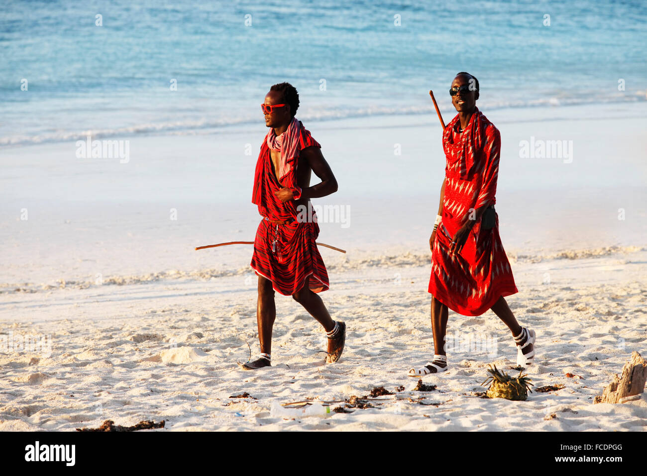 Young massai man with colorful traditional clothes Stock Photo - Alamy