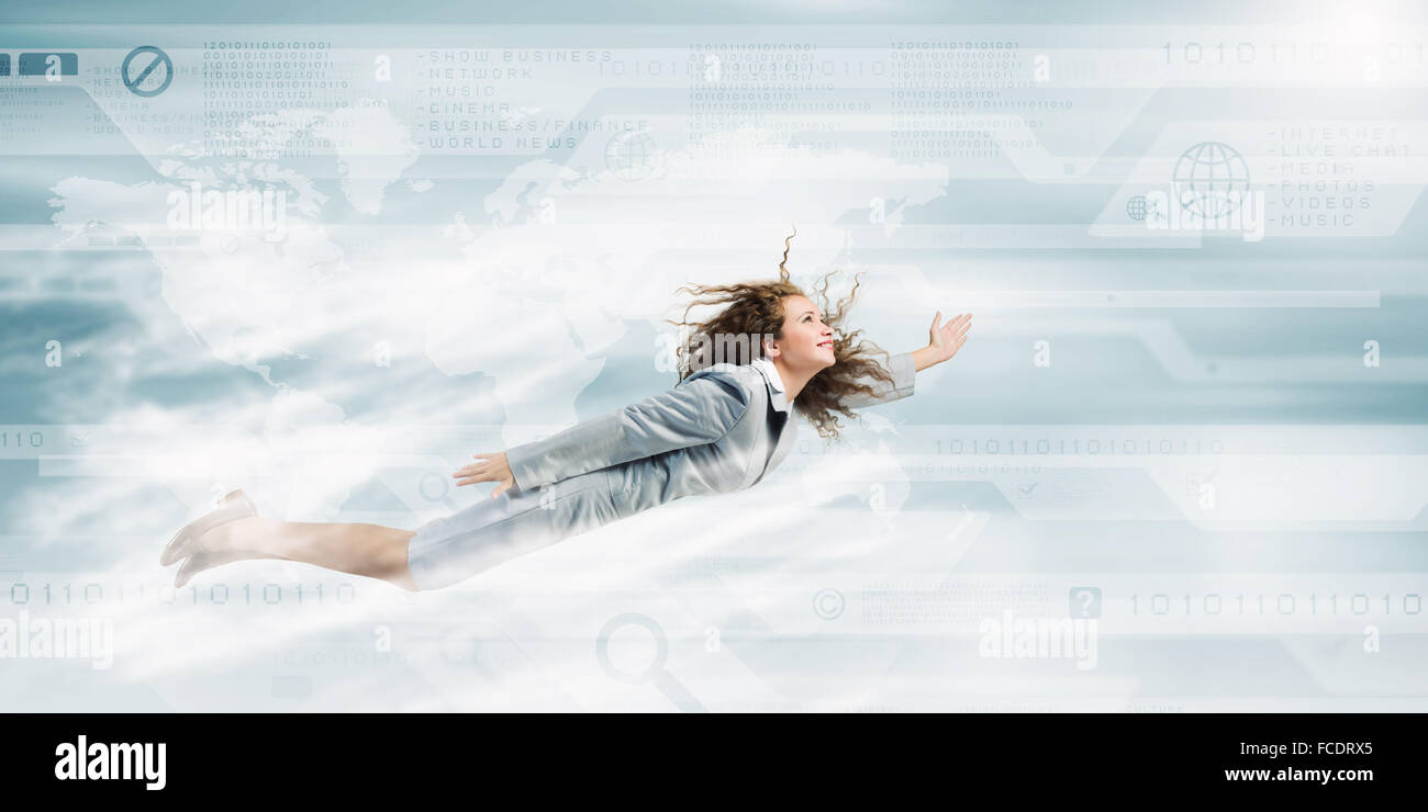 Young happy businesswoman flying high in sky Stock Photo - Alamy