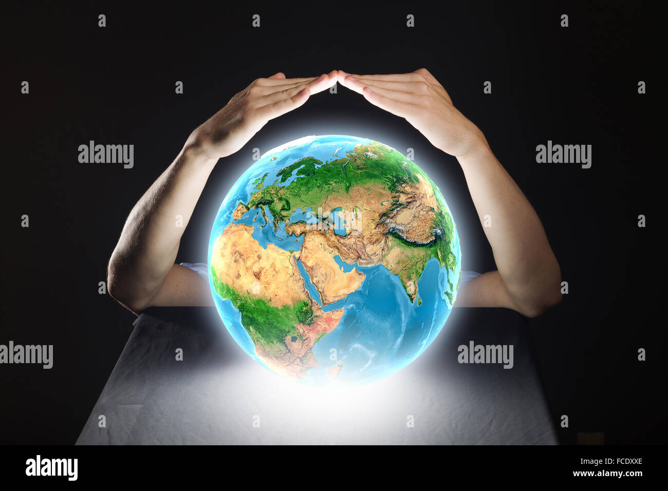 Close up of human hand holding Earth planet. Elements of this image are ...