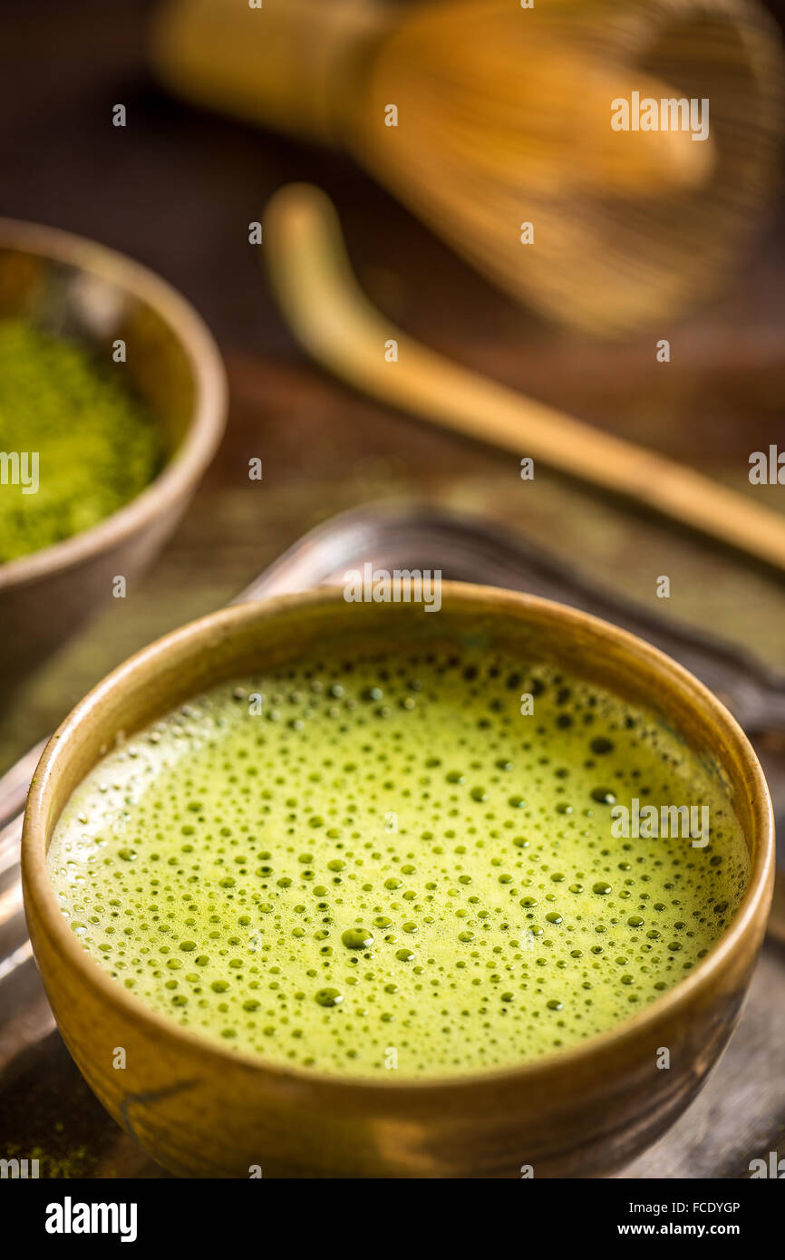 Matcha green tea in a matcha bowl Stock Photo - Alamy