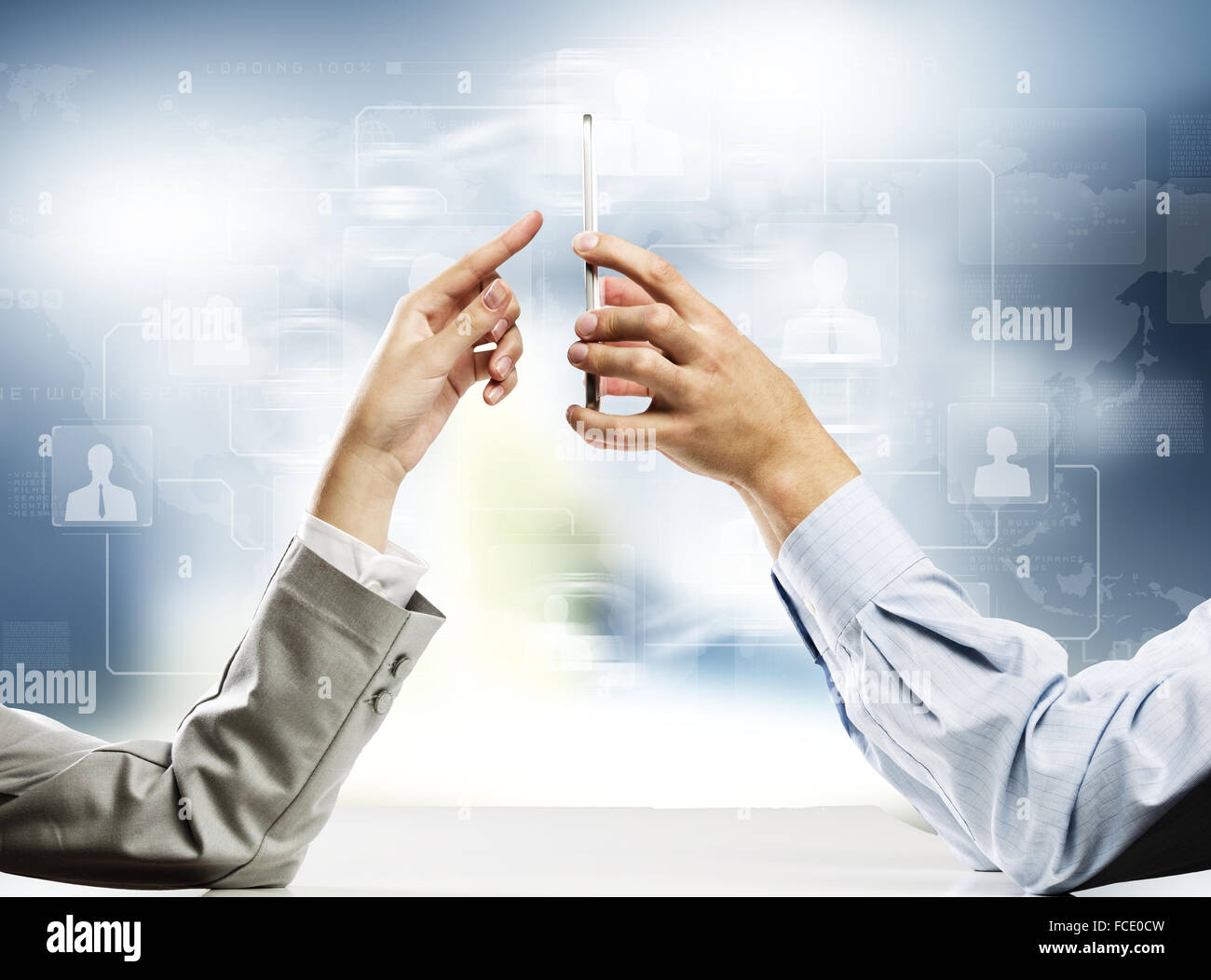 Two business people using one mobile phone at the same time Stock Photo ...