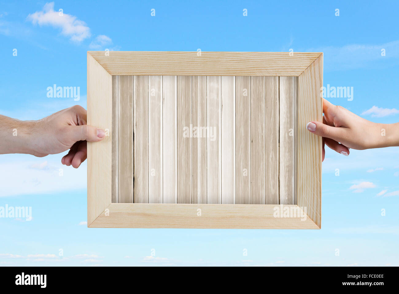 Human hands holding frame hi-res stock photography and images - Alamy