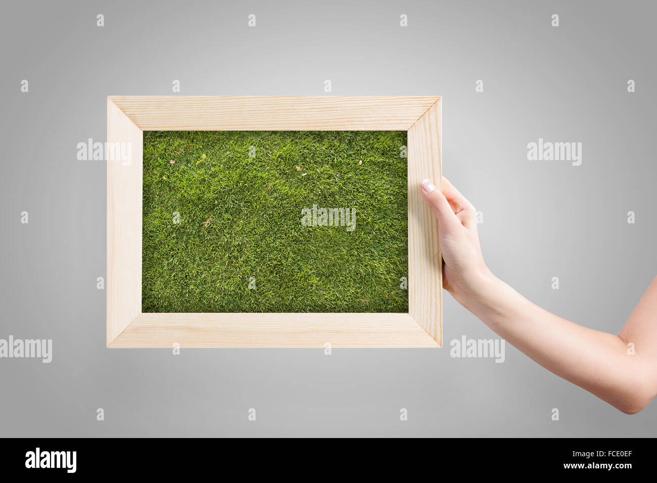 Hand holding frame hi-res stock photography and images - Alamy