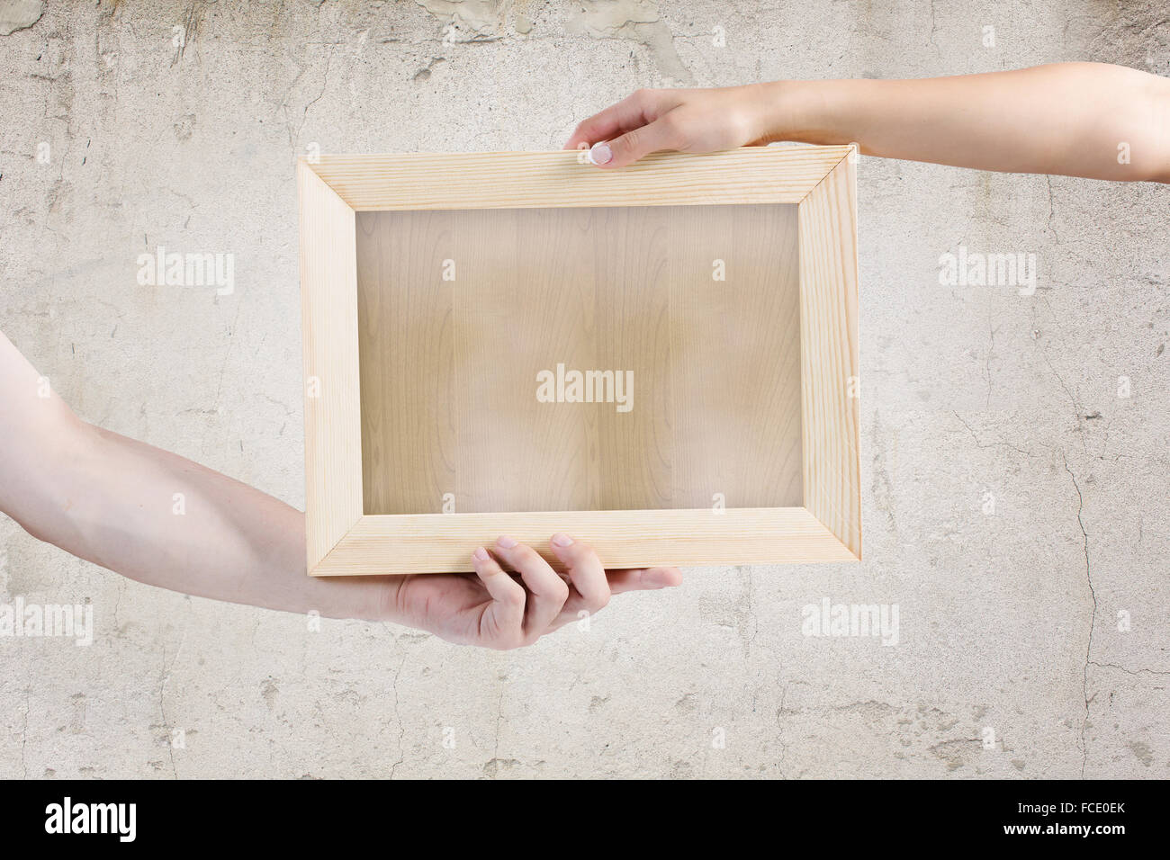 Human hands holding frame hi-res stock photography and images - Alamy
