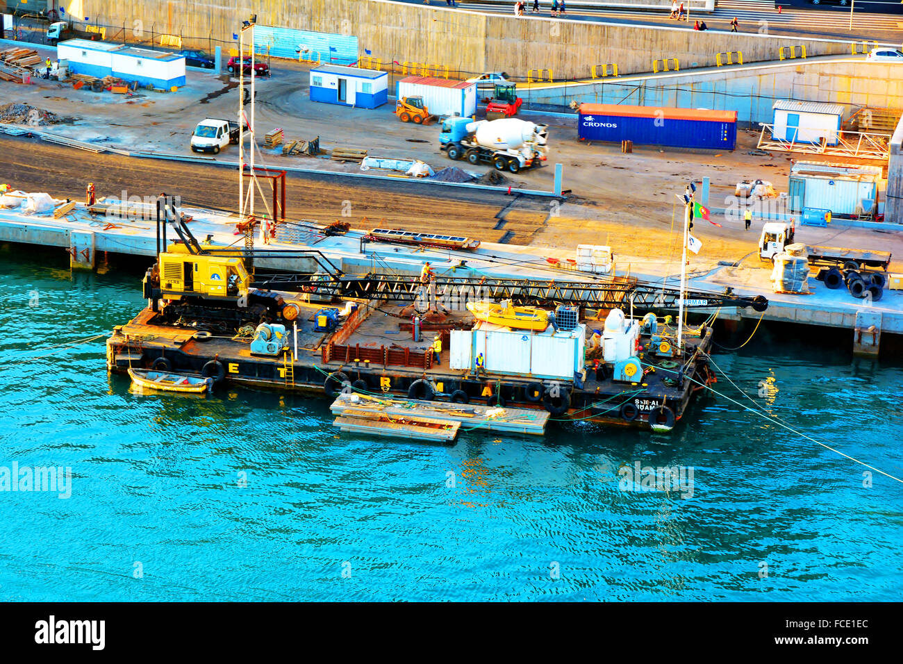 Madeira Funchal harbour dock floating crane and barge Stock Photo - Alamy