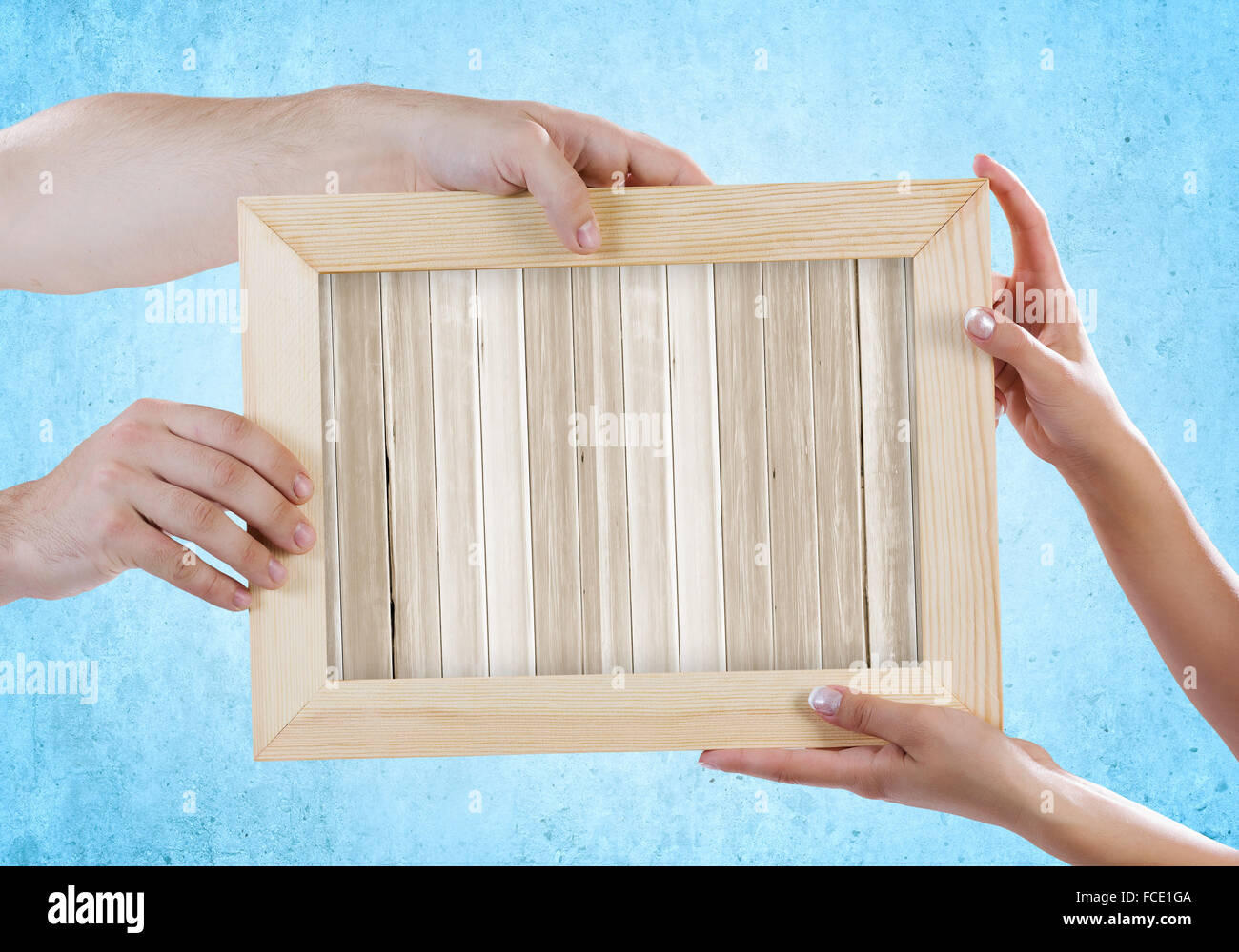 Human hands holding frame hi-res stock photography and images - Alamy