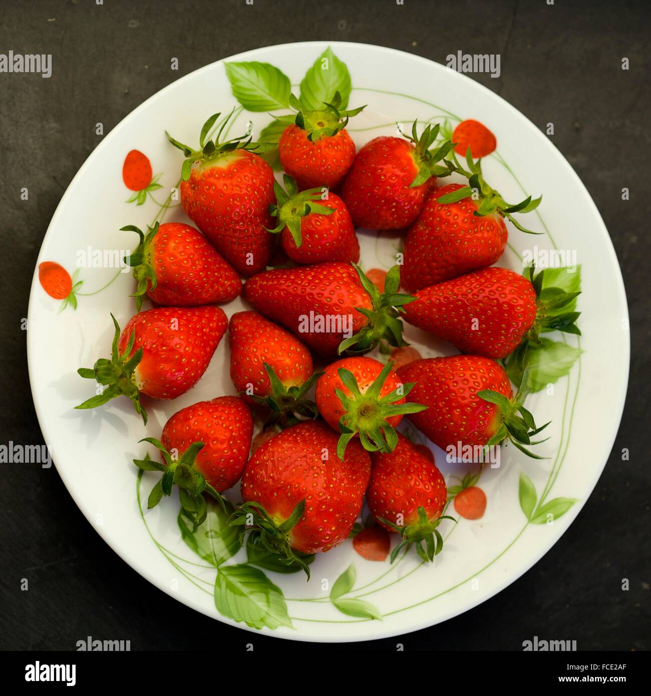 Plate of strawberries Stock Photo - Alamy