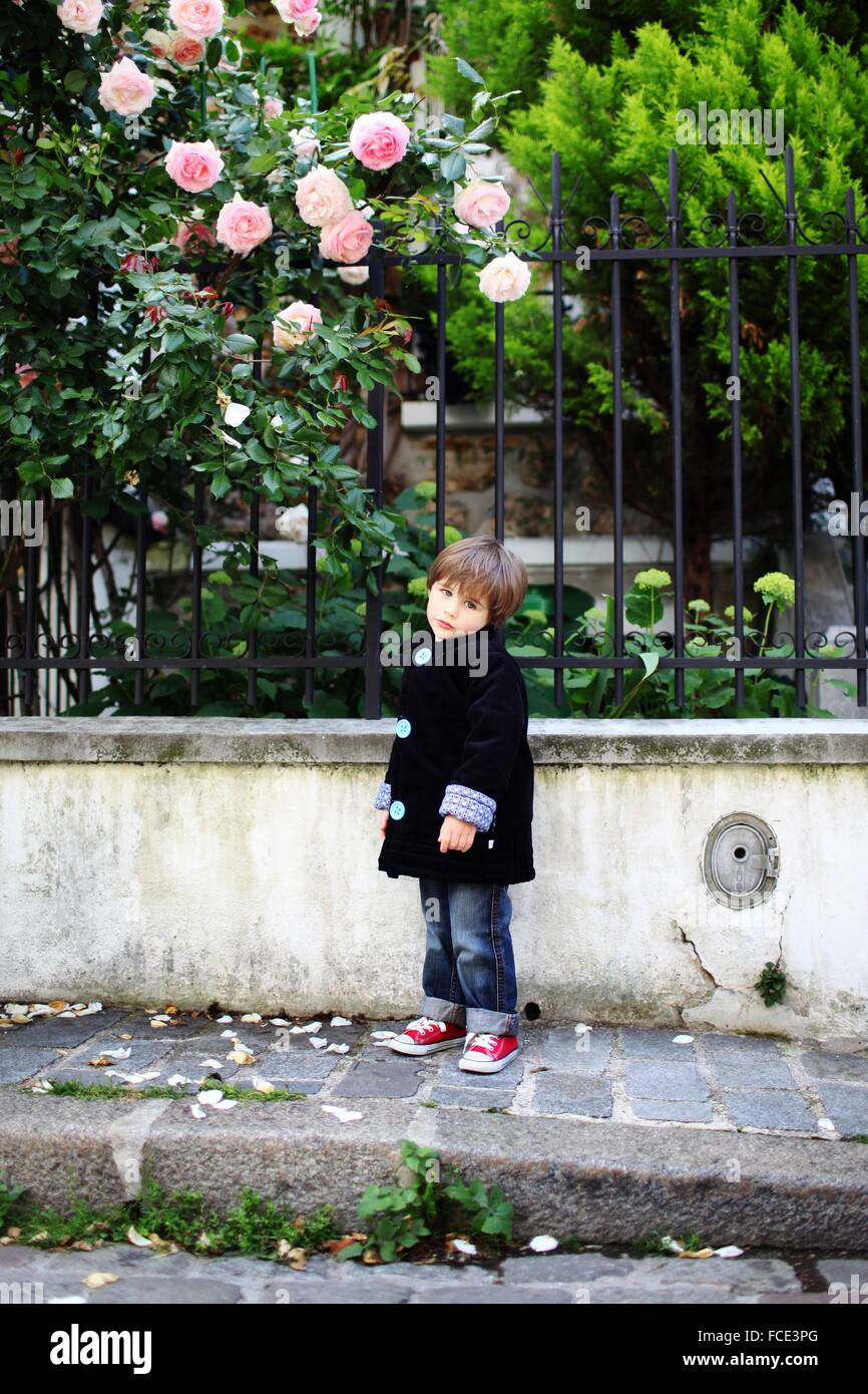 Little boy sulking in a cobbled narrow street Stock Photo - Alamy