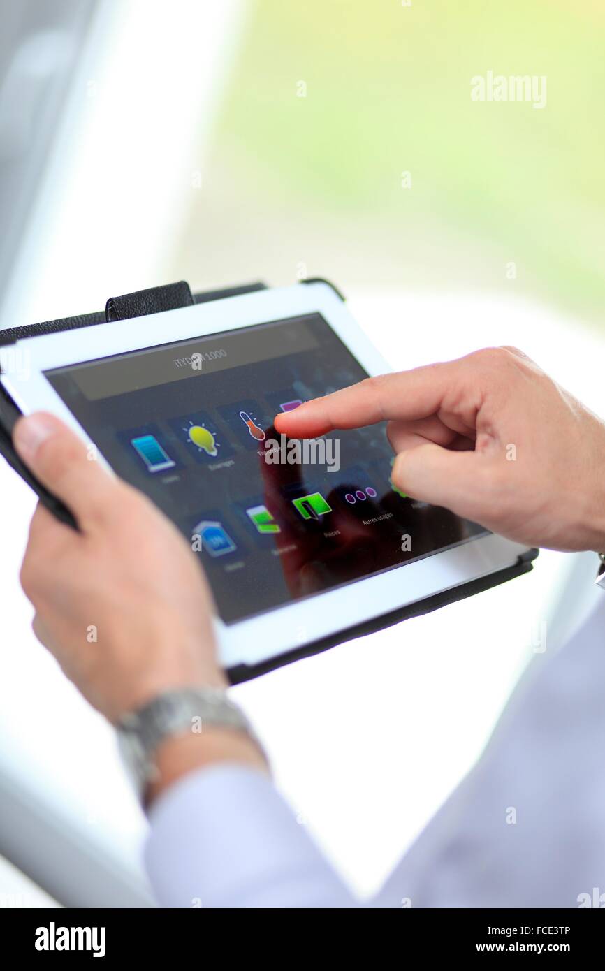 Tablet home control hi-res stock photography and images - Alamy