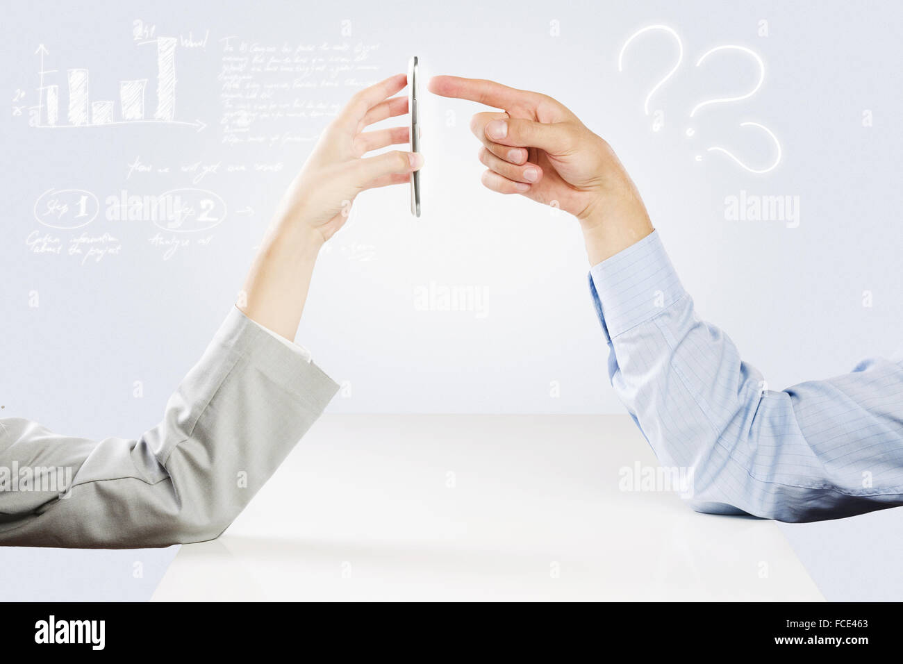 Two business people using one mobile phone at the same time Stock Photo ...