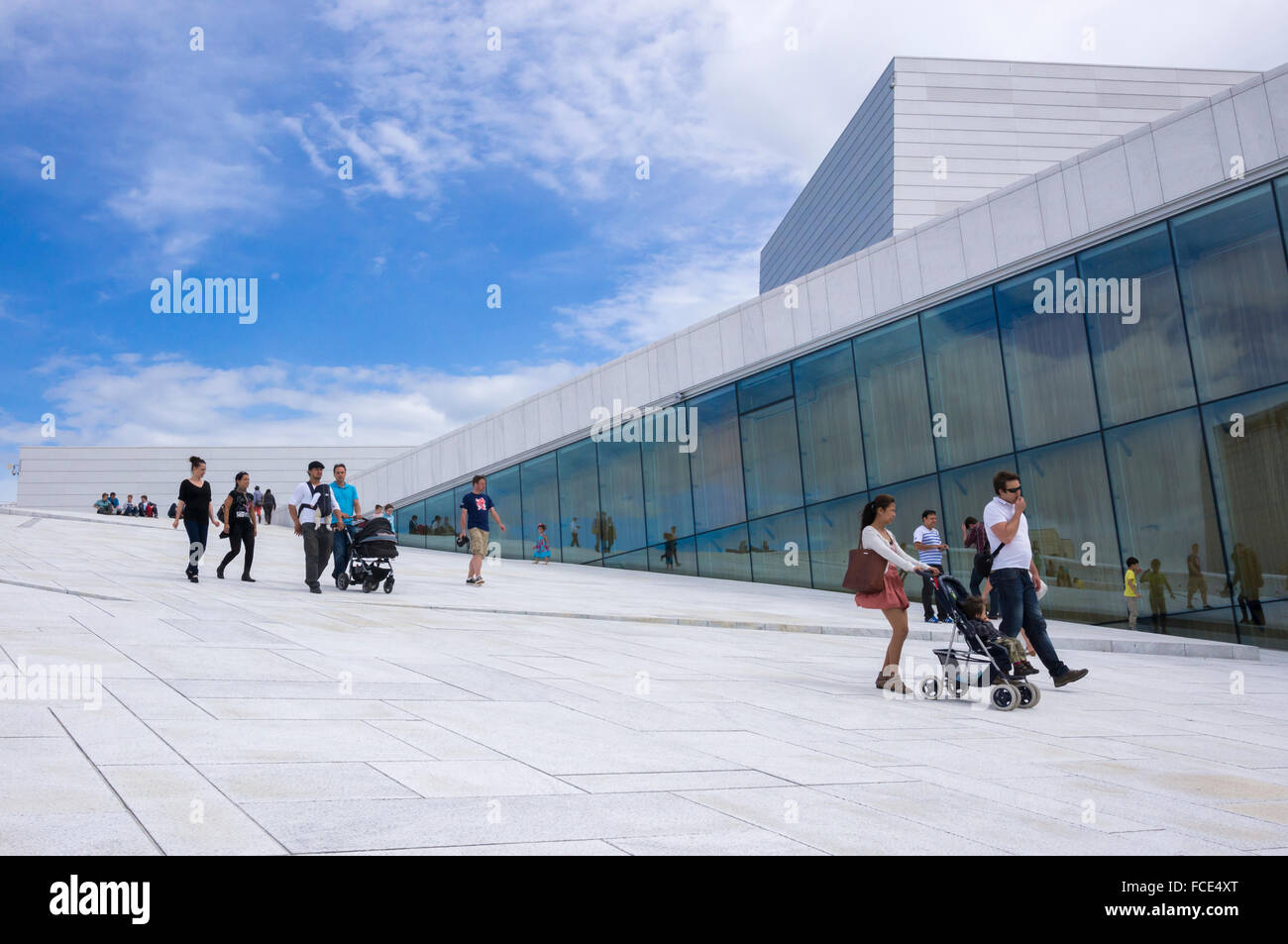 People walking on the roof of the Oslo Opera House, Oslo, Norway Stock ...