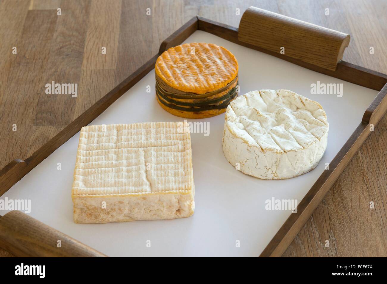 France, Normandy, cheeseboard with three typical norman cheeses Stock ...