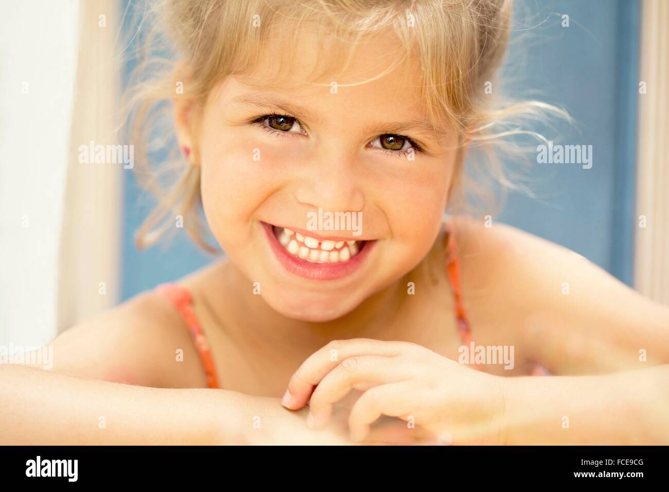 Close-up of little girl smiling Stock Photo - Alamy