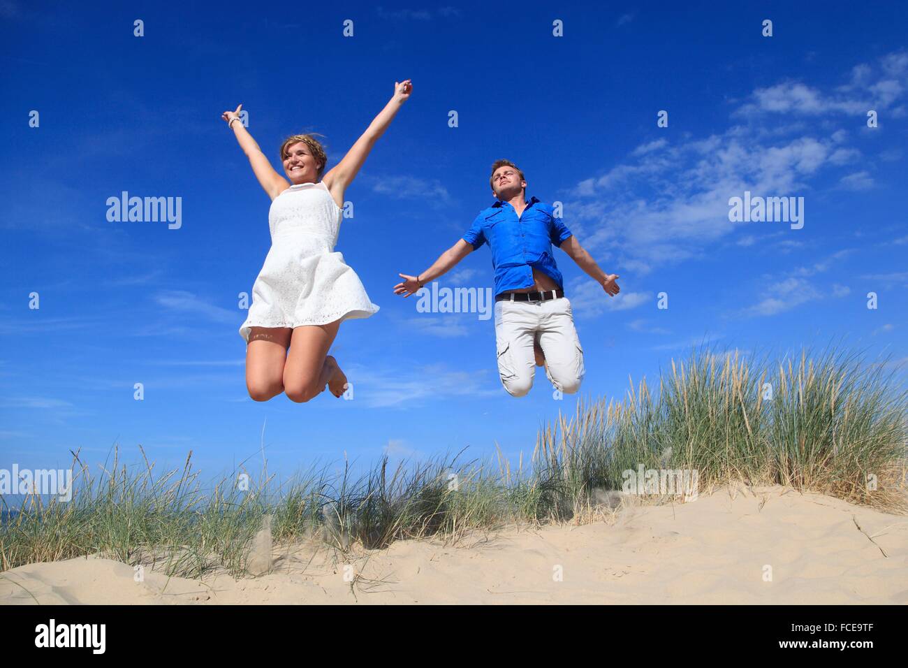 France, happy couple on beach Stock Photo - Alamy
