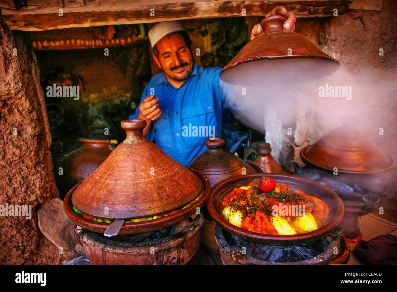 Food: cooking a ´tajine´ in the Ourika valley, near Marrakech, Morocco ...