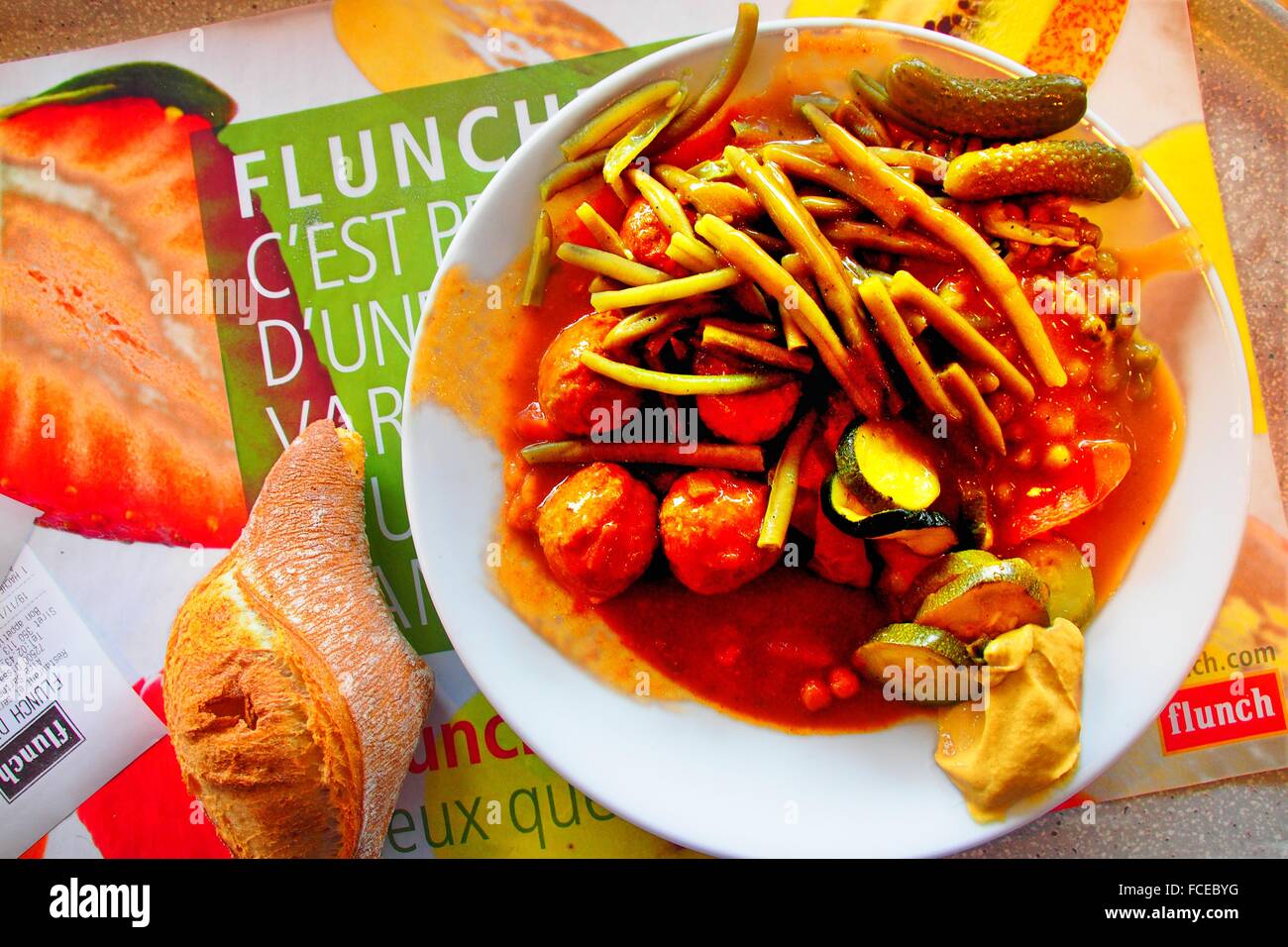Meatballs with tomato sauce and beans at Flunch fast food restaurant ...